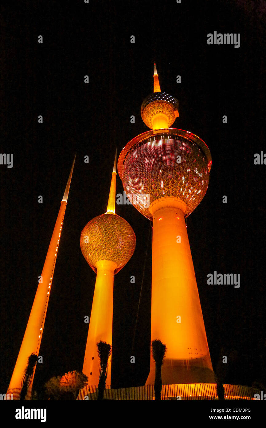 Kuwait Towers with animated graphics light at night Stock Photo - Alamy