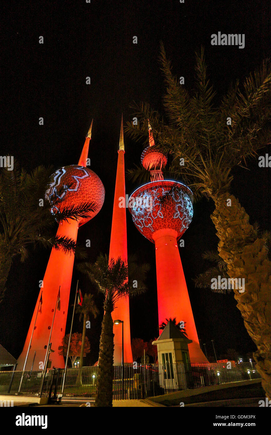 Kuwait Towers with animated graphics light at night Stock Photo - Alamy