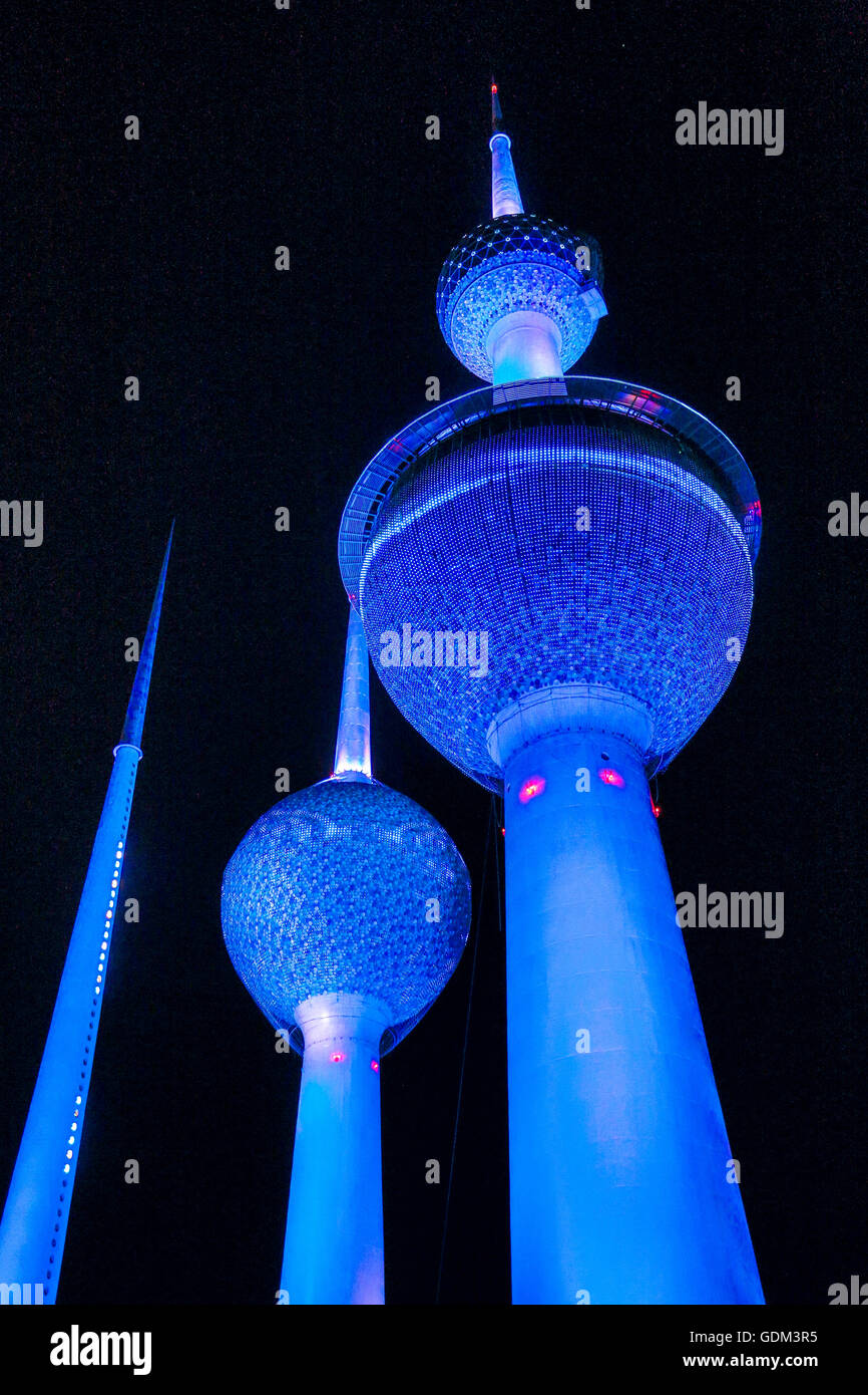 Kuwait Towers with animated graphics light at night Stock Photo - Alamy