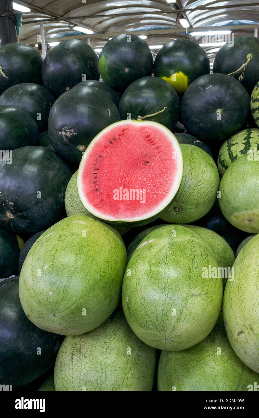 Stall full of fresh and ripe watermelon at a fruit and vegetable market ...