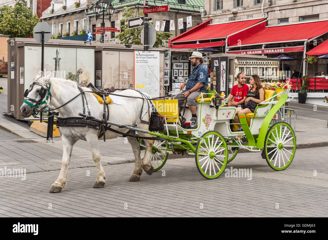 Tourists enjoy a caleche ride in Old Montreal (2016 Stock Photo - Alamy