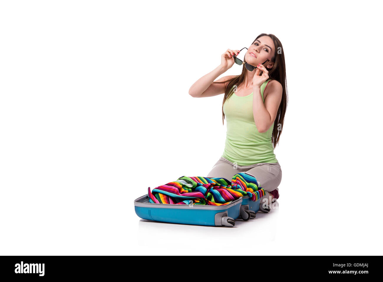 Woman packing preparing for summer vacation isolated on white Stock ...