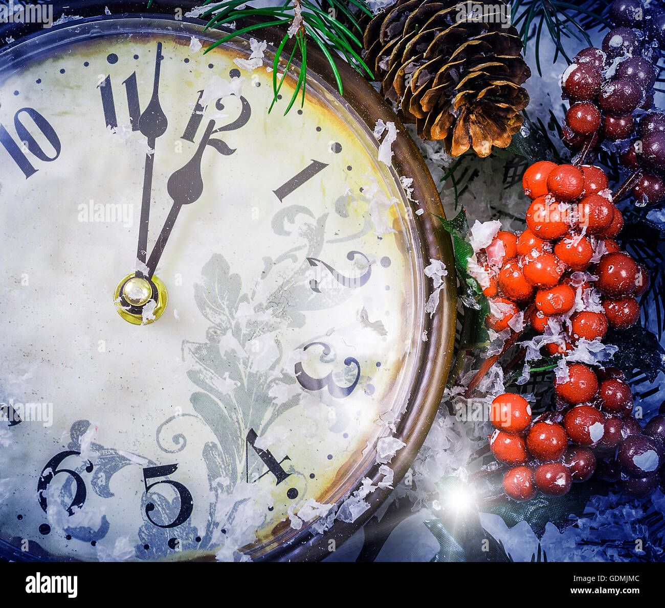 Christmas Eve and New Years at midnight. Clock covered with snow at ...