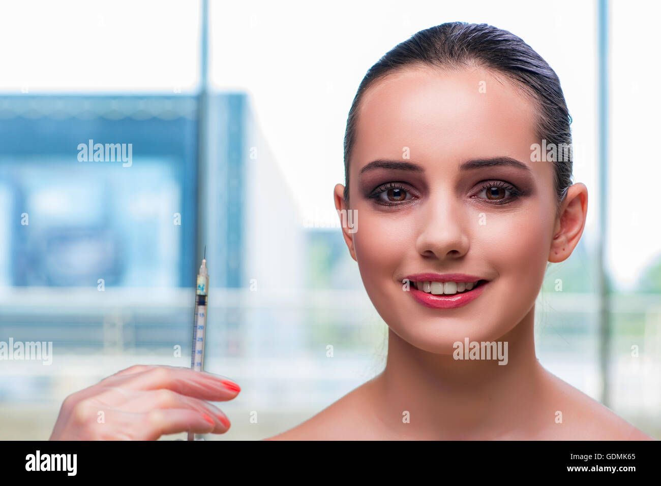 Beautiful woman preparing for botox injection Stock Photo - Alamy
