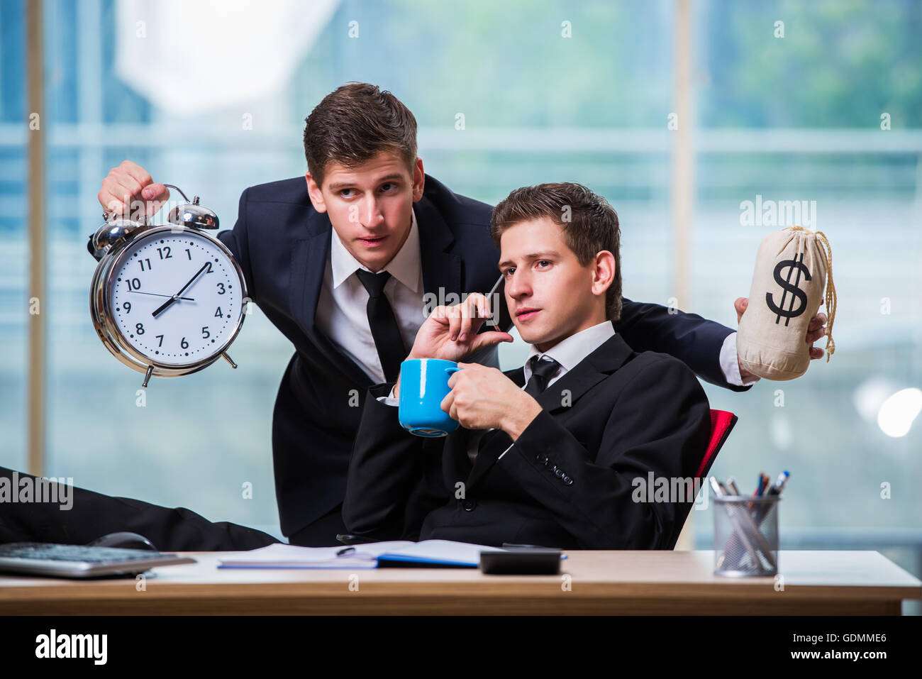 Time is money concept with two businessman Stock Photo - Alamy