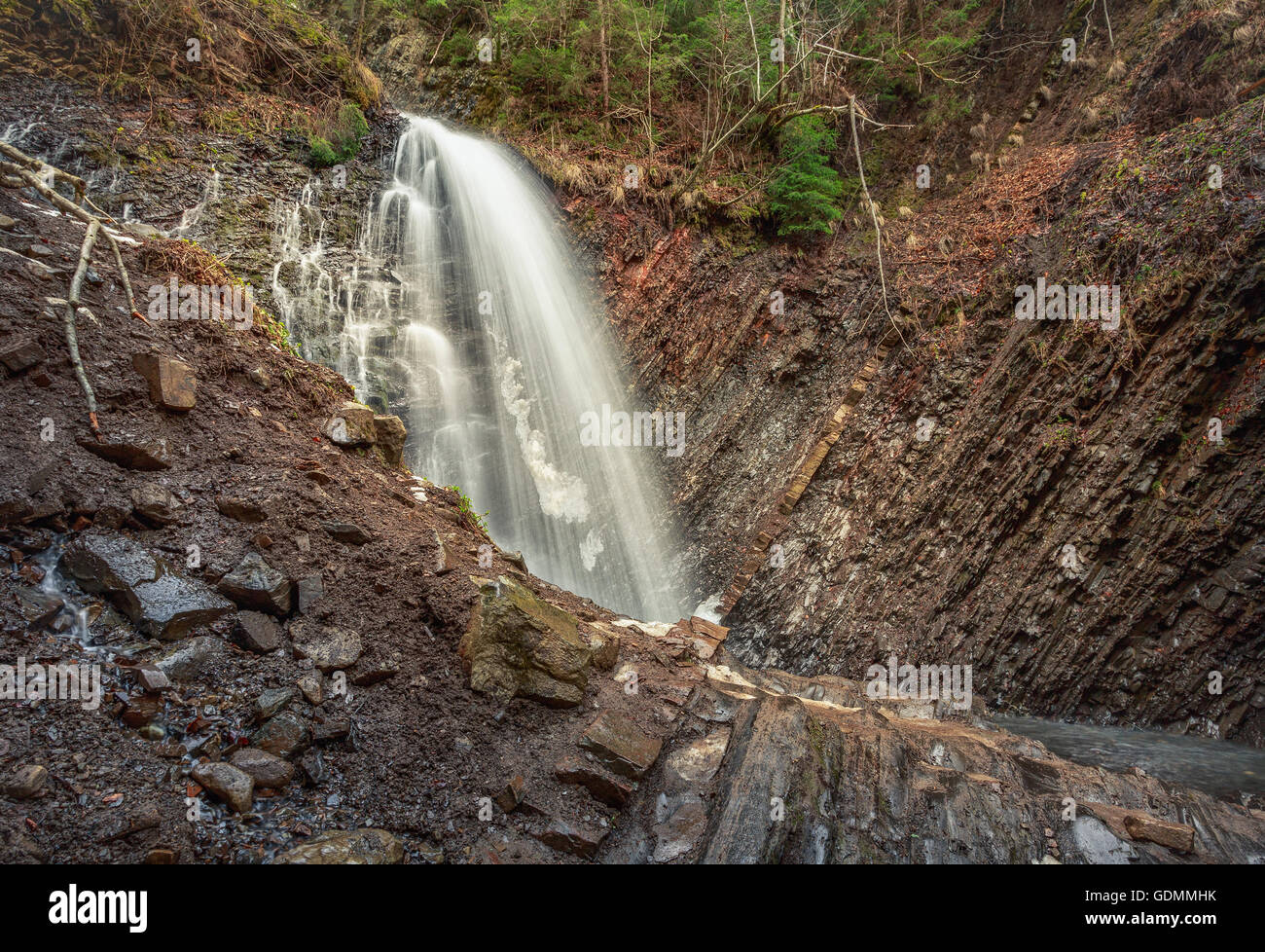 mountain waterfall in spring forest with stone rock Stock Photo - Alamy