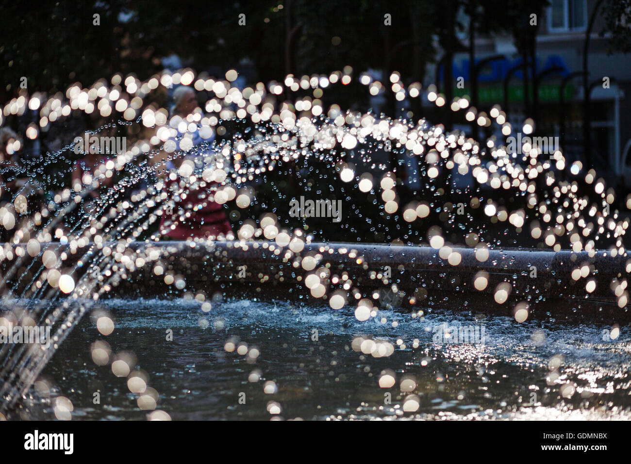 Water stream splashing on ground Stock Photo - Alamy