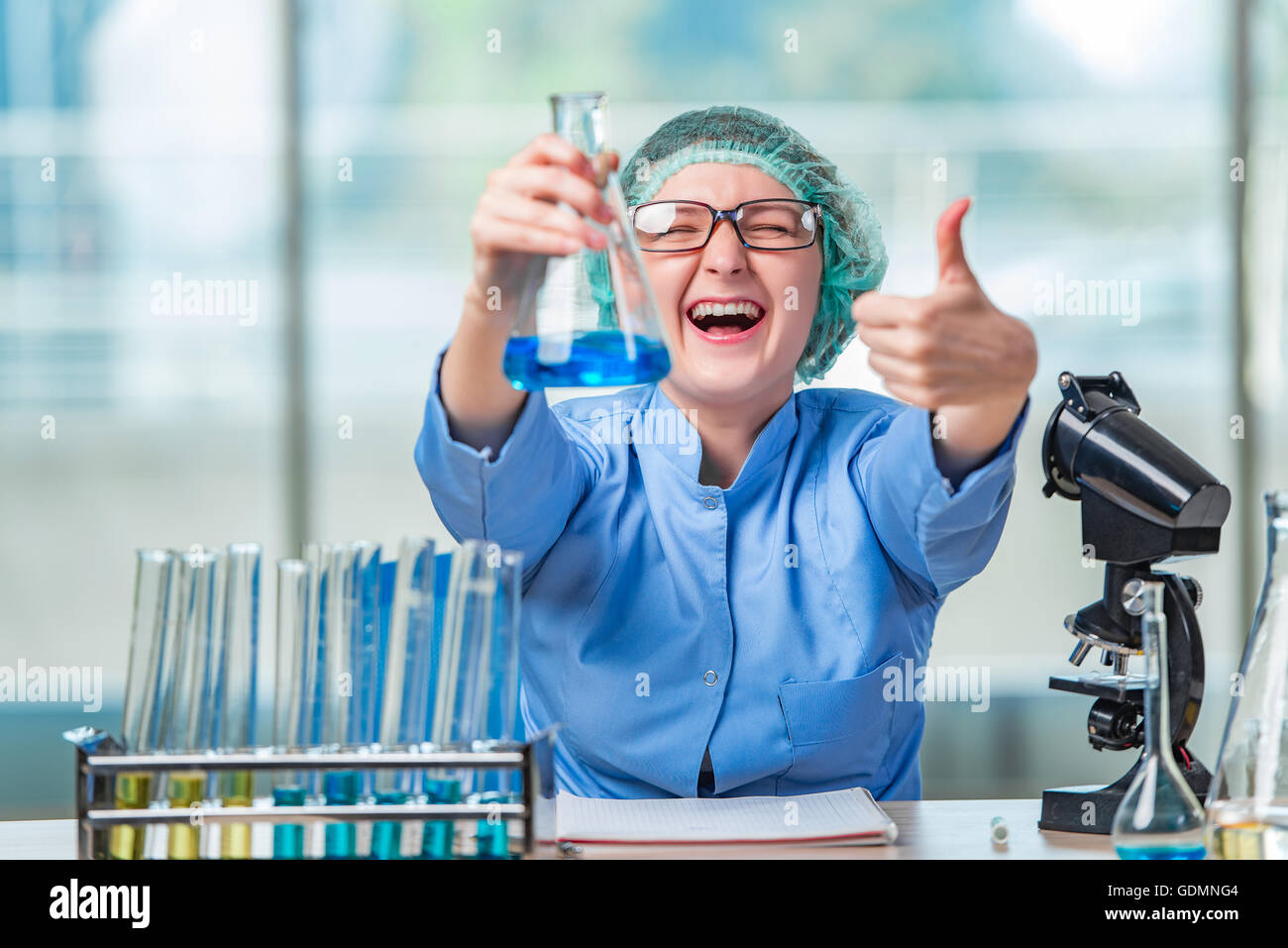 Experienced lab assistant working on chemical solutions Stock Photo - Alamy