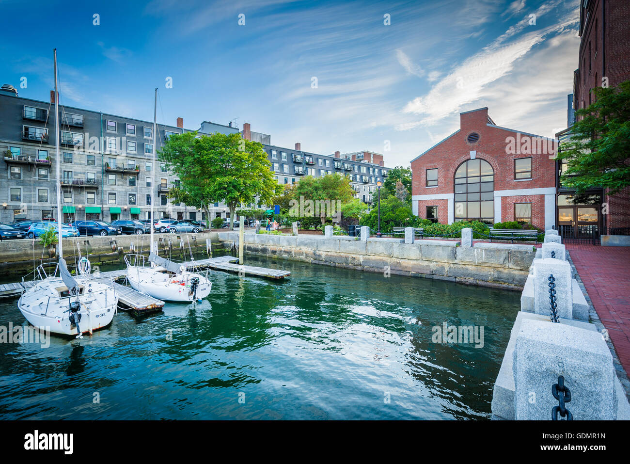Buildings and boats docked on the waterfront in Boston, Massachusetts ...