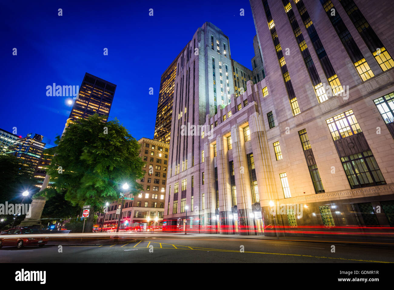 Buildings at Post Office Square at night, in the Financial District, of ...