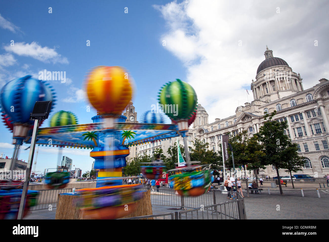 Fairground carousel roundabout; three-month funfair festival ...