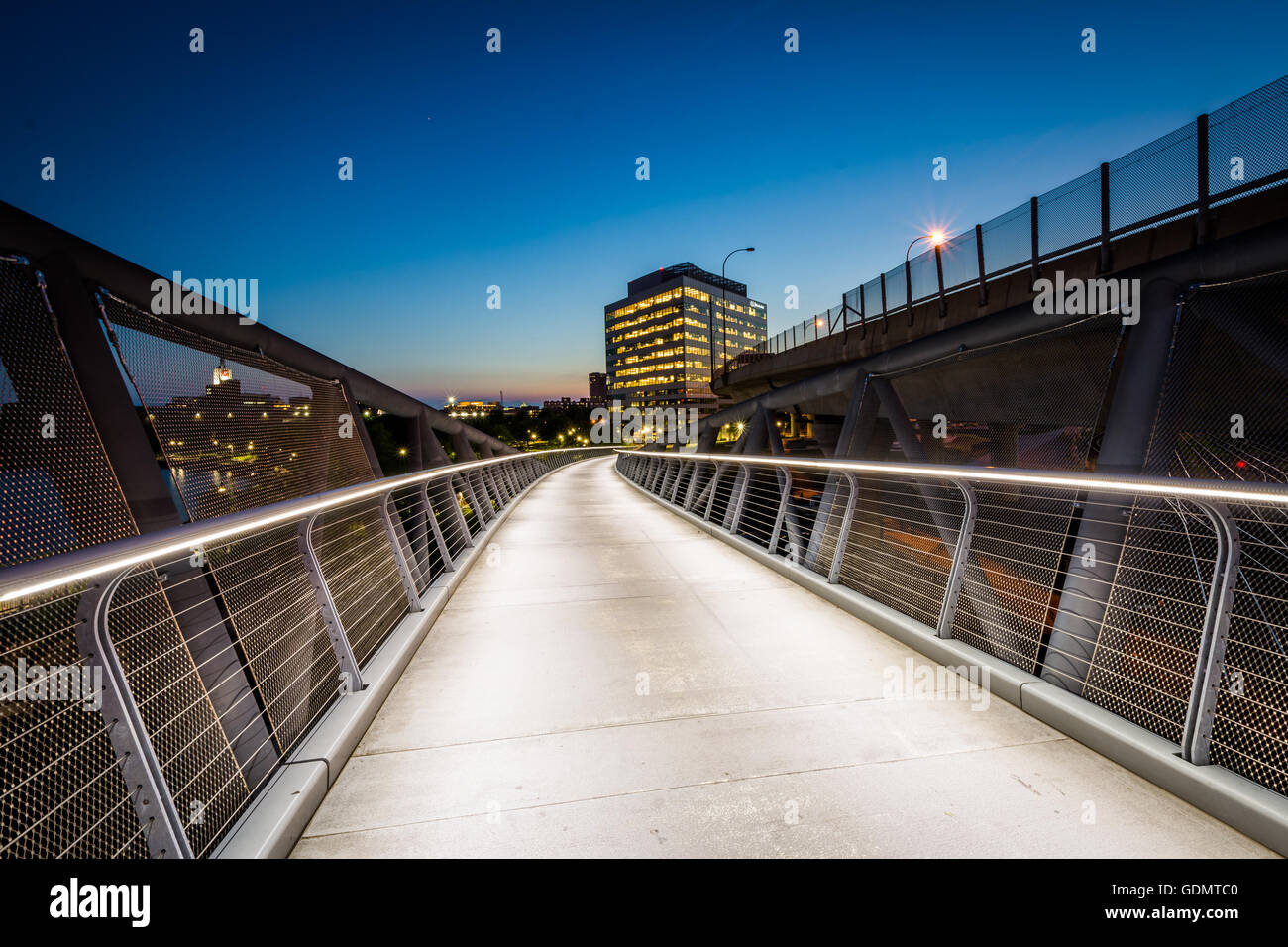 The North Bank Pedestrian Bridge at night, in Cambridge, Massachusetts ...
