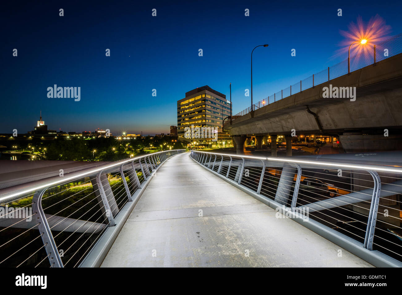 The North Bank Pedestrian Bridge at night, in Cambridge, Massachusetts ...