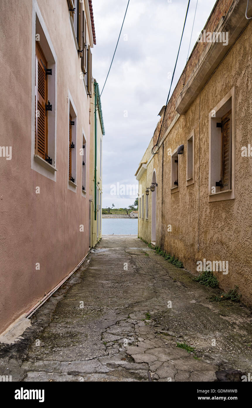 Street and buildings in Paxoi island, Greece, on an overcast day Stock ...