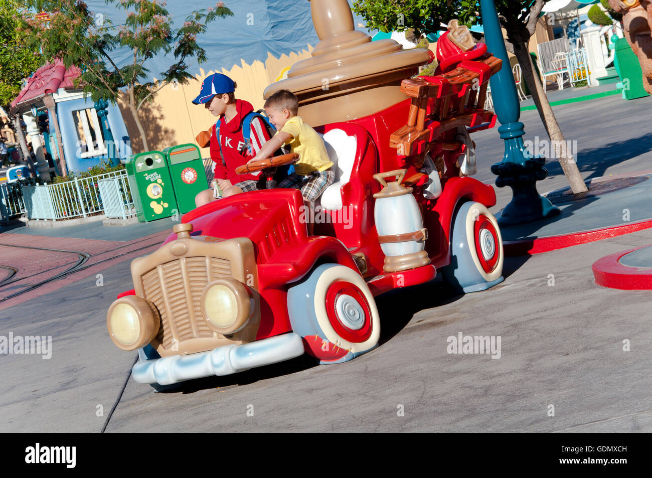 Two Boys Playing in the Car at Disneyland Amusement Park, California ...
