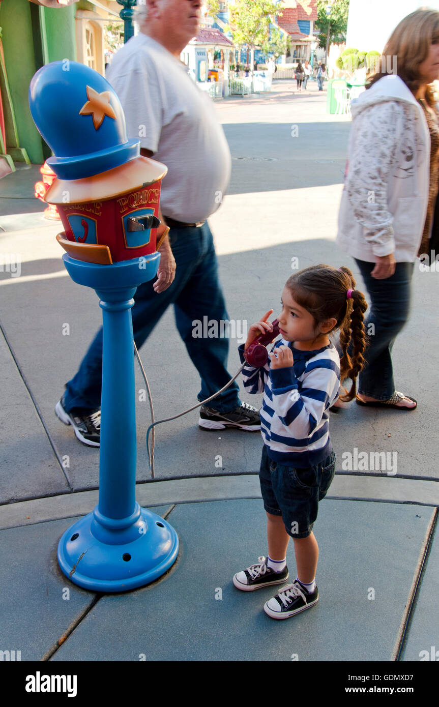 Little Girl Calling from Disneyland Amusement Park, California Stock ...
