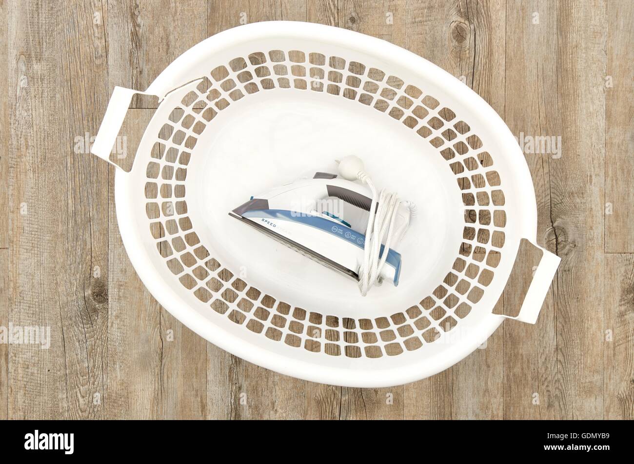 A studio photo of a laundry washing basket Stock Photo - Alamy