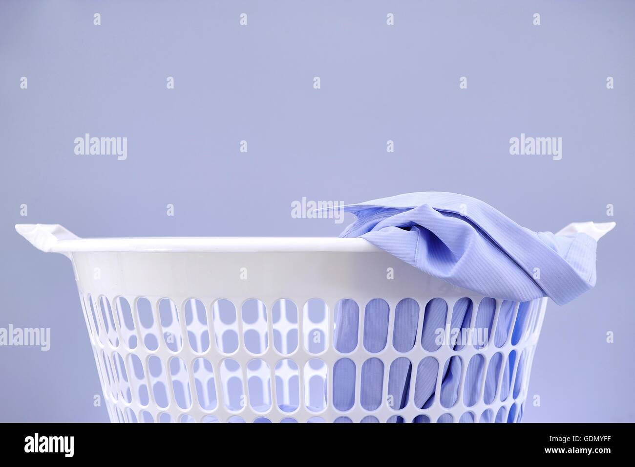 A studio photo of a laundry washing basket Stock Photo - Alamy