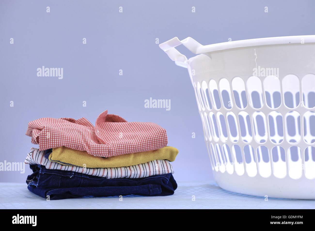 A studio photo of a laundry washing basket Stock Photo - Alamy