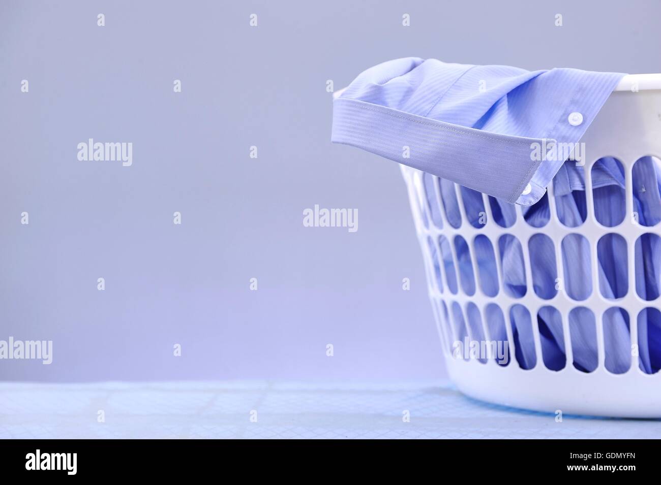 A studio photo of a laundry washing basket Stock Photo - Alamy