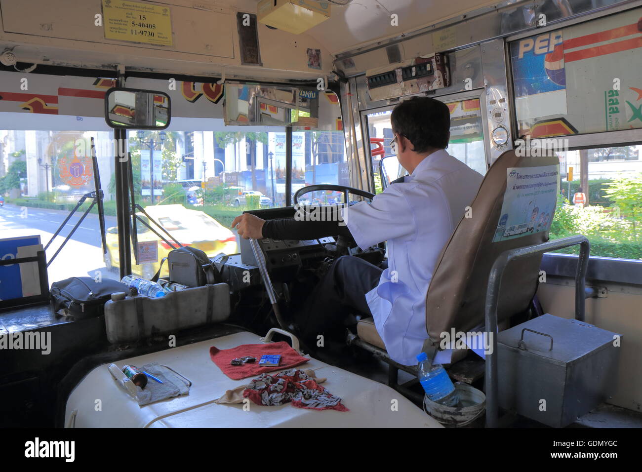 A bus driver drives bus in Bangkok Stock Photo - Alamy