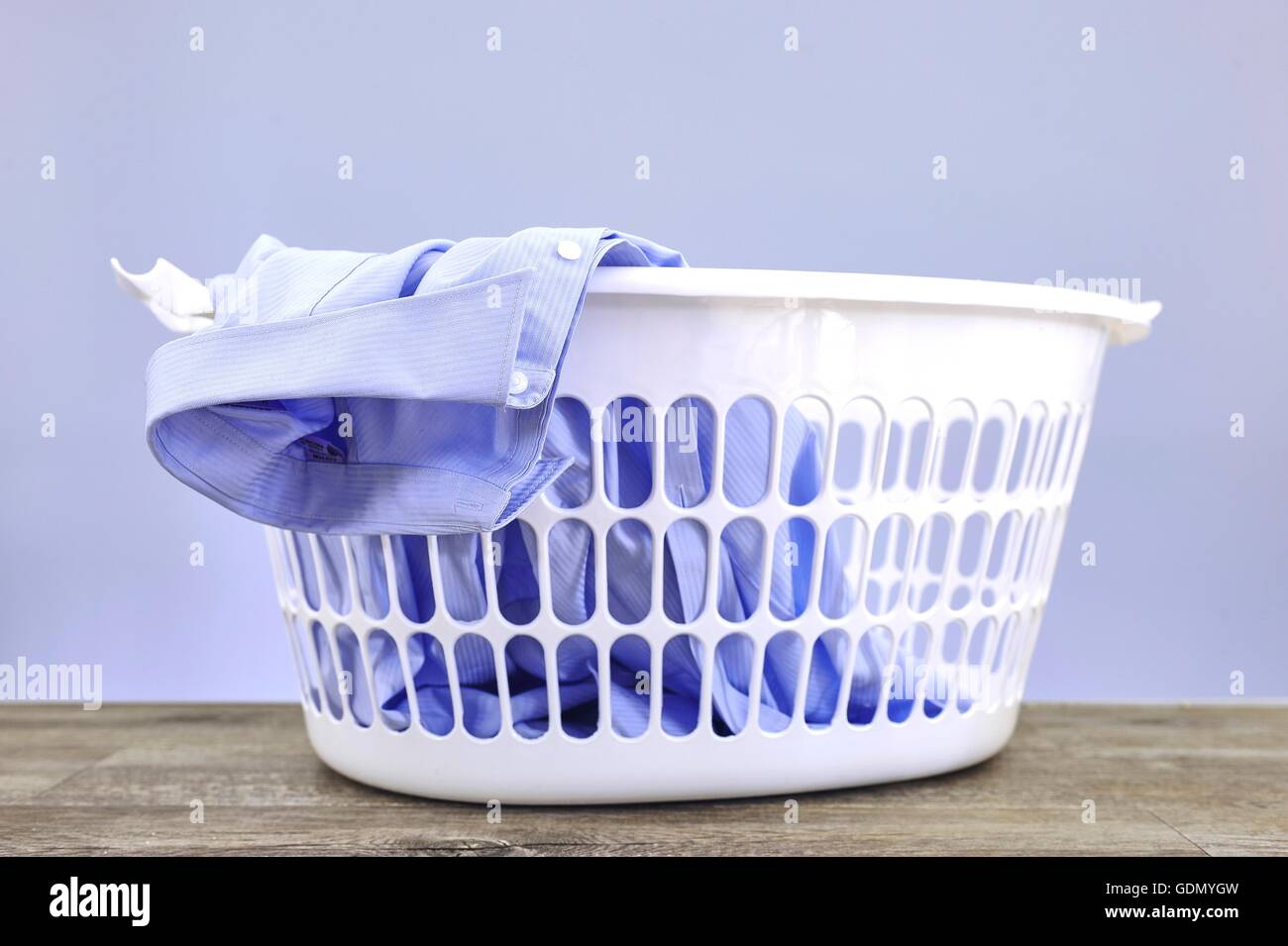 A studio photo of a laundry washing basket Stock Photo - Alamy
