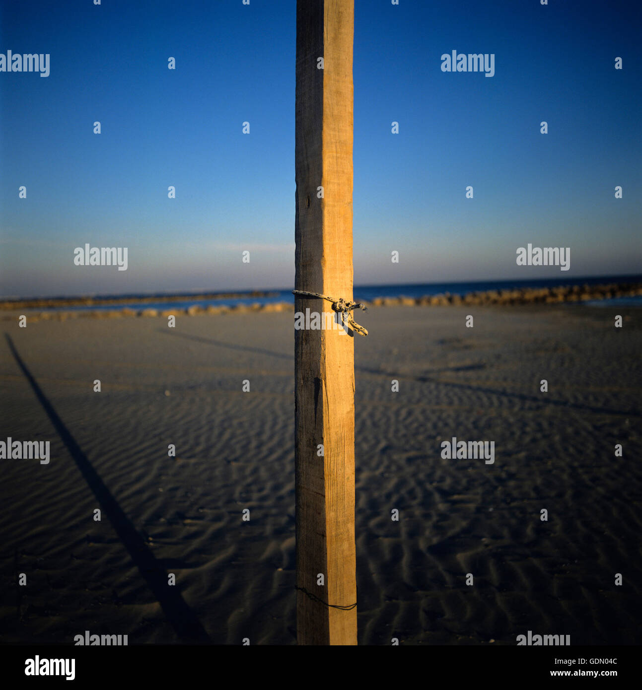 Post on a beach Stock Photo - Alamy