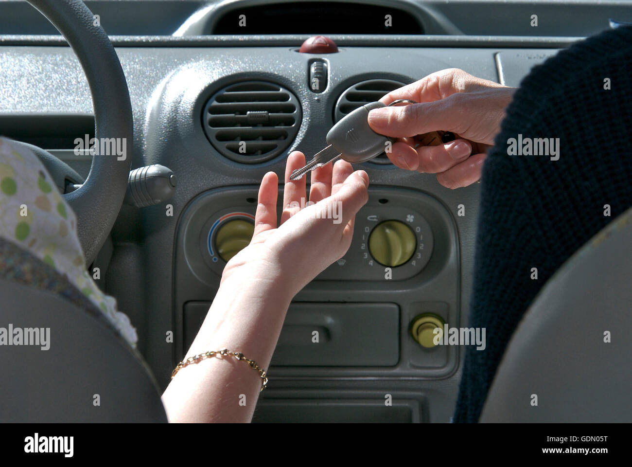 Female driver gives keys hi-res stock photography and images - Alamy