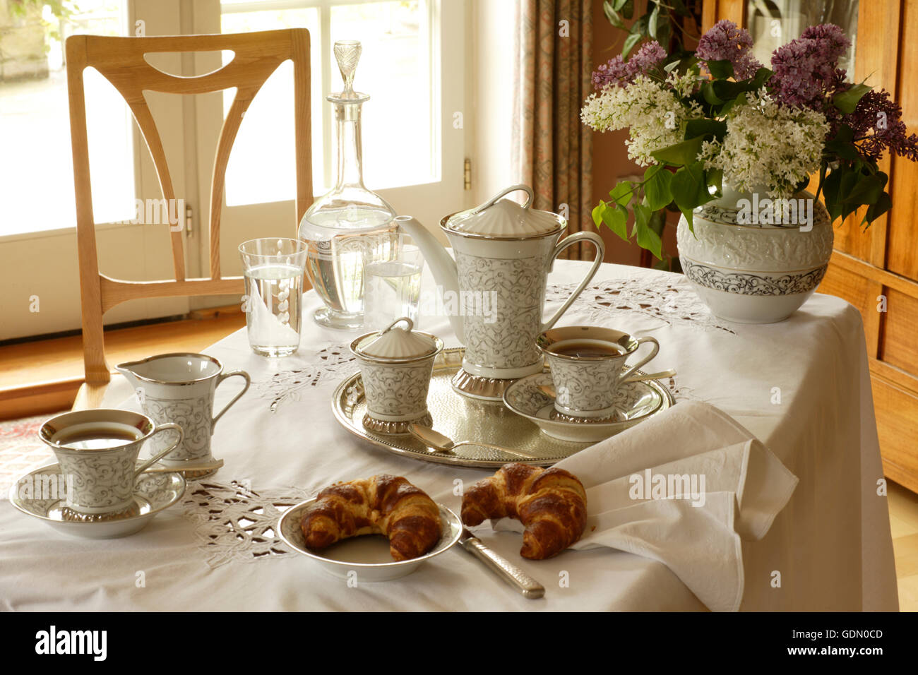 Still life, well-laid breakfast table Stock Photo - Alamy