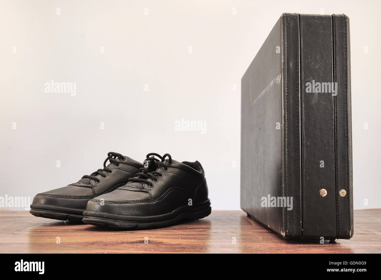 A studio photo of black walking shoes Stock Photo - Alamy