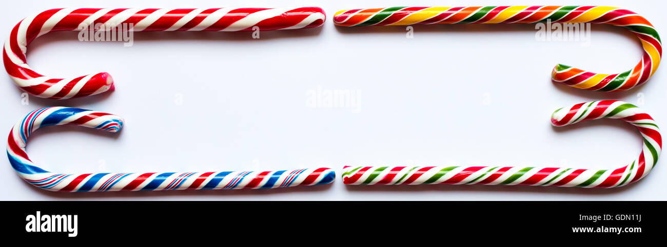 Four candy canes building a frame Stock Photo - Alamy