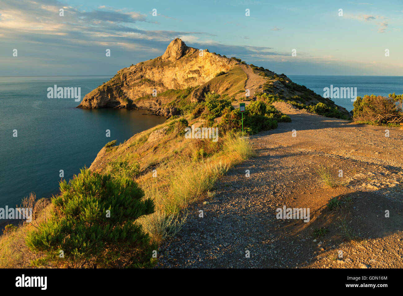 Beautiful Cape Kapchik in the Black Sea illuminated rising sun. Crimea ...