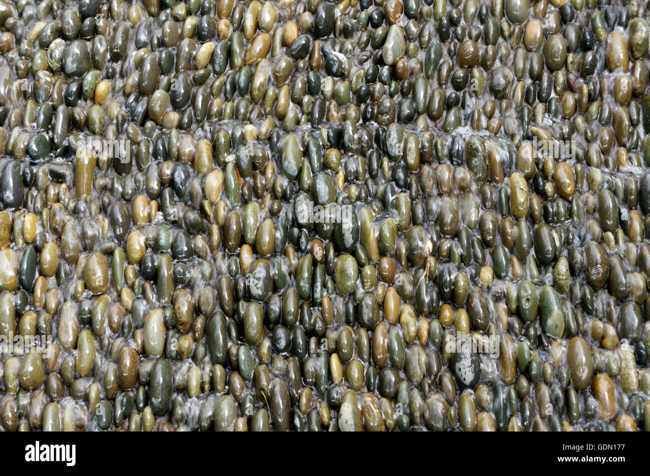 Rounded river rocks hi-res stock photography and images - Alamy