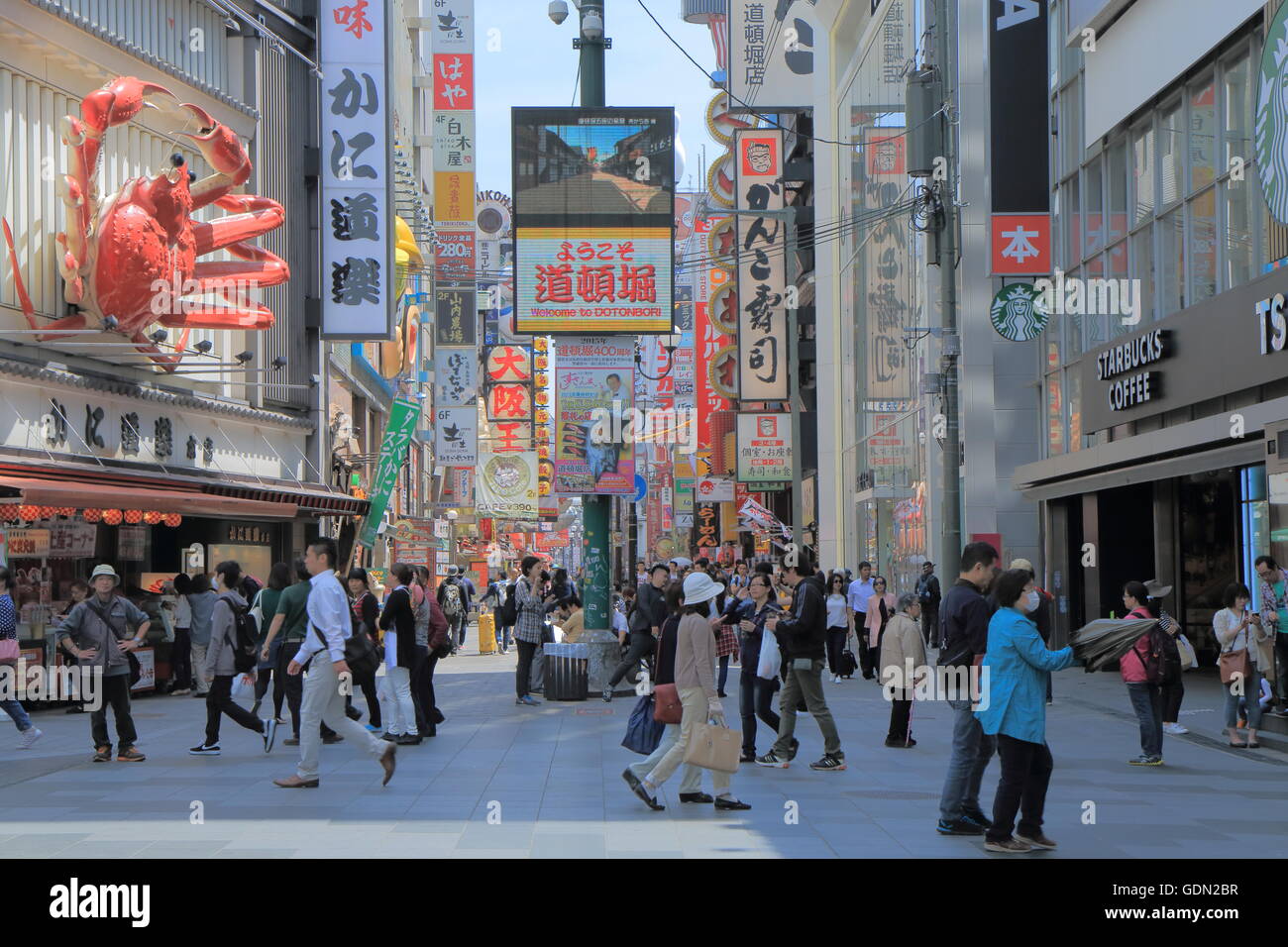 People visit Dotonbori entertainment district in Osaka Japan Stock ...