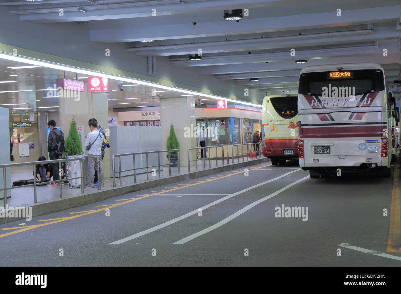 People wait for bus at Hankyu Bus Terminal in Osaka Japan Stock Photo ...