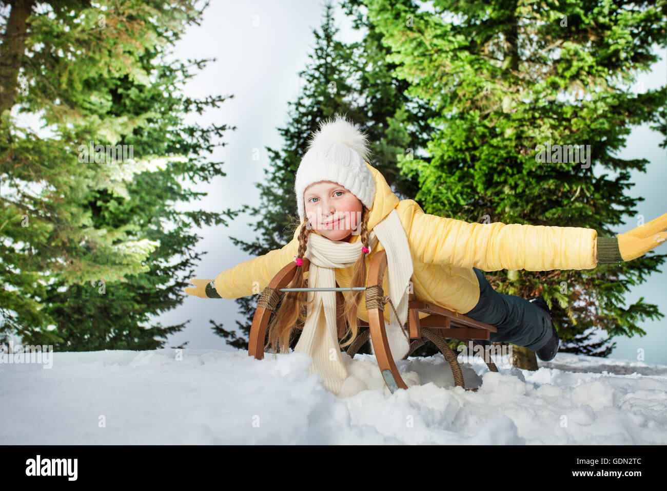 Snow sledge child fir hi-res stock photography and images - Alamy