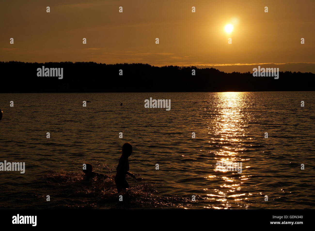 Beautiful sunset at the beach, amazing colors, light beam shining ...