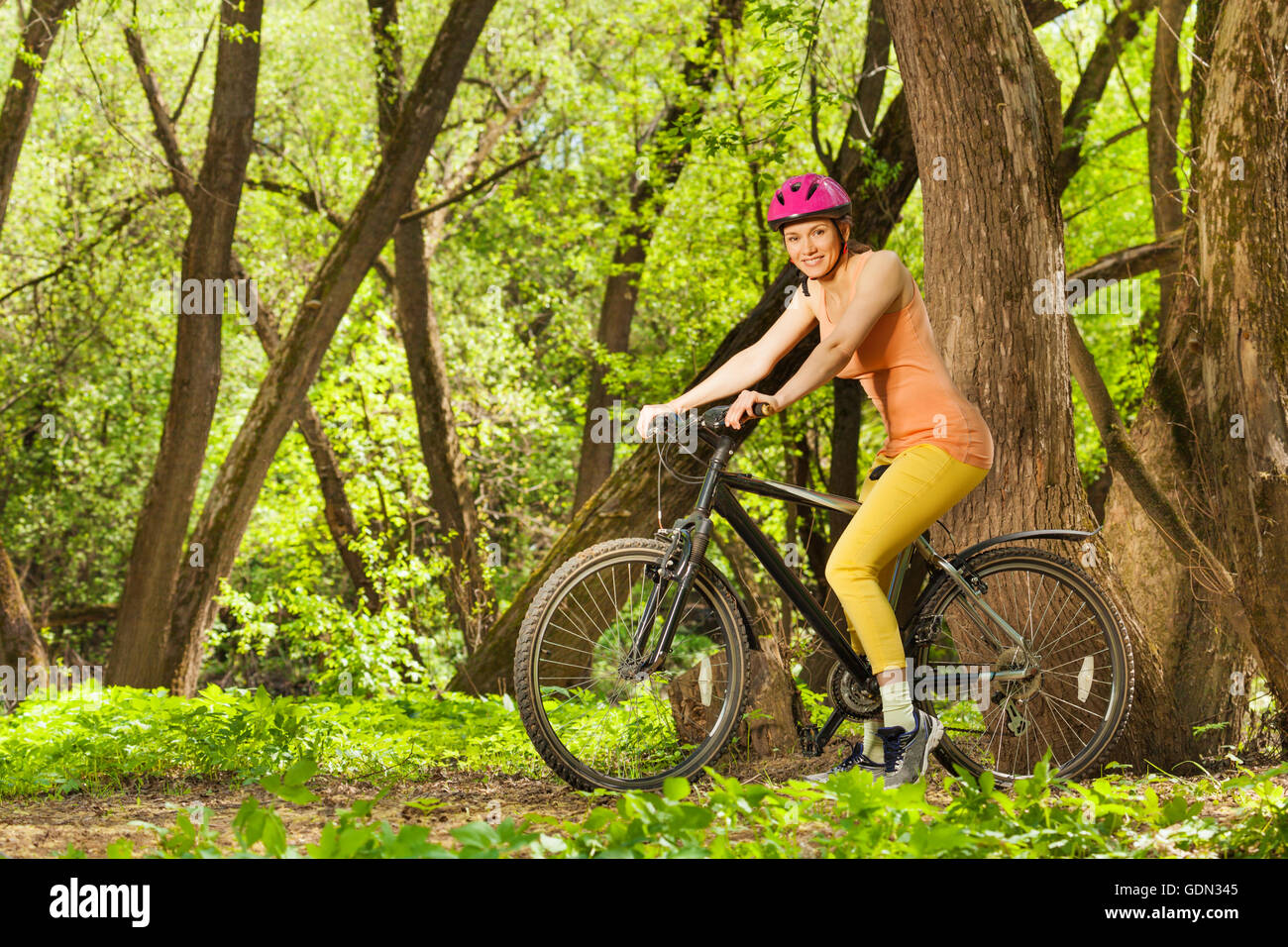 Riding bike woman spring hi-res stock photography and images - Alamy