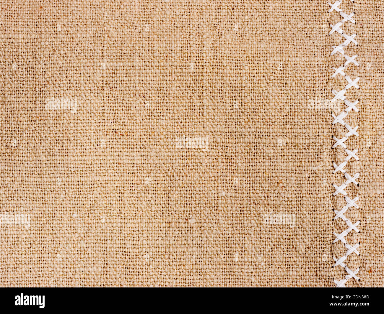 Cotton fabric with cross stitch as background Stock Photo - Alamy