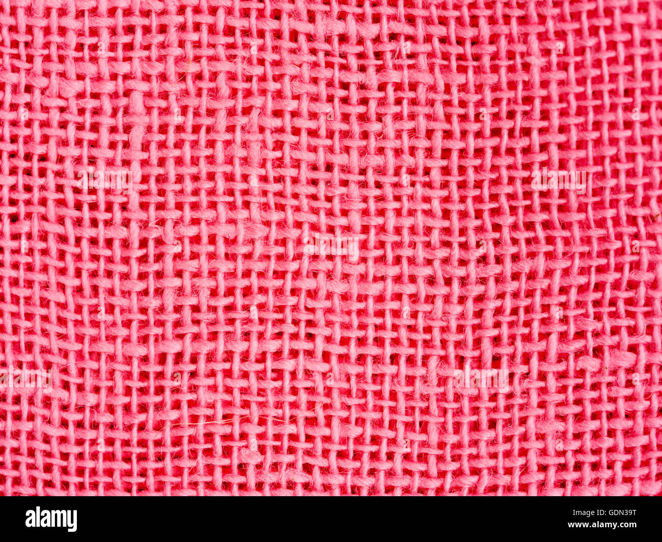 Natural pink fabric weaving as background texture Stock Photo - Alamy