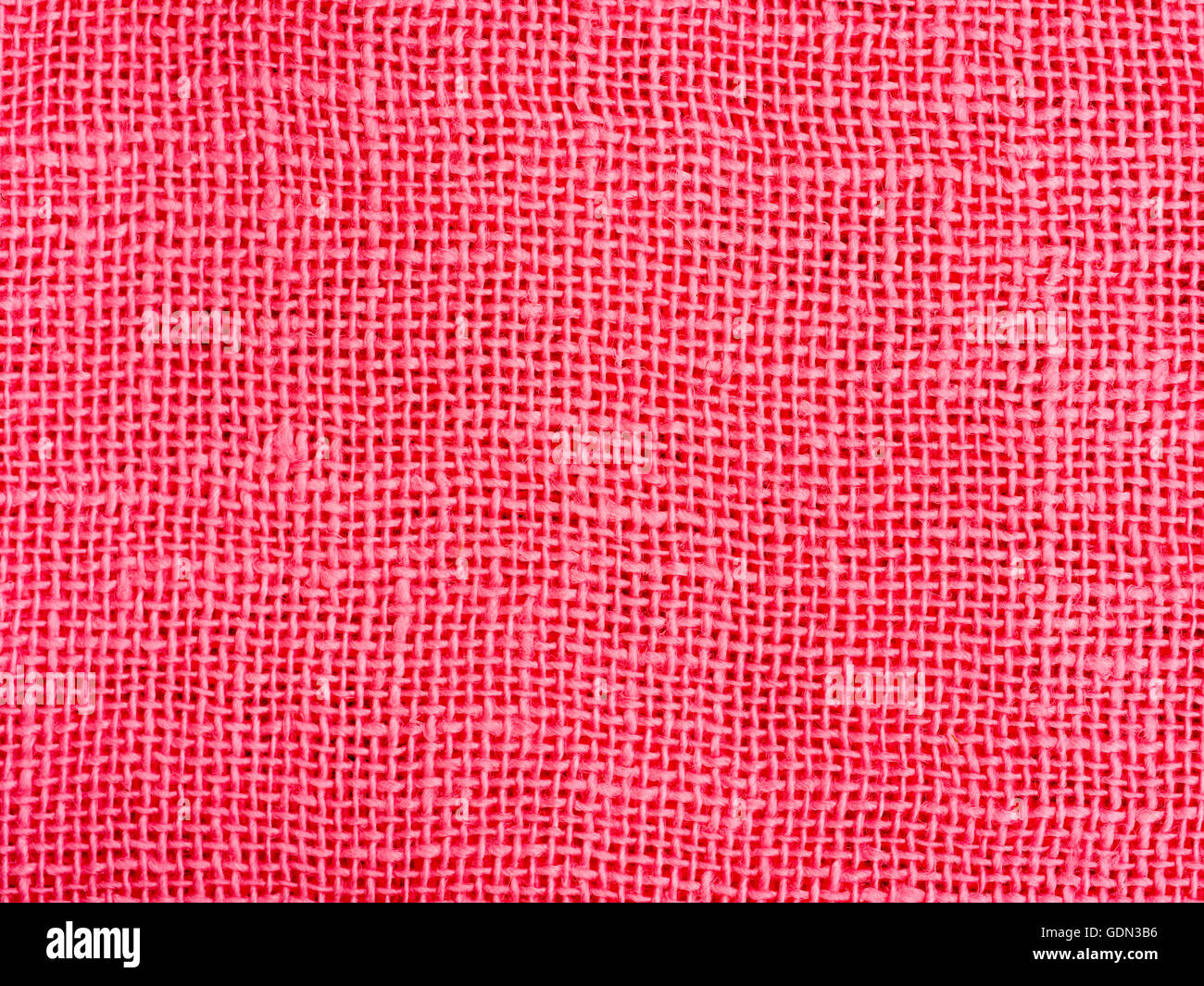 Natural pink fabric weaving as background texture Stock Photo - Alamy