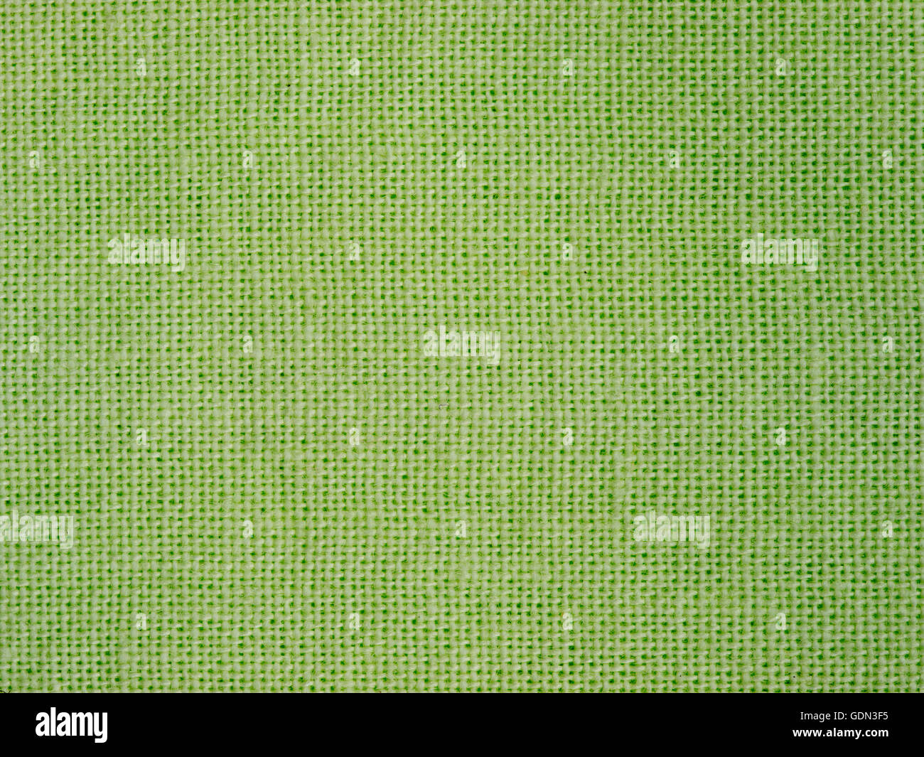 Natural green fabric weaving as background texture Stock Photo - Alamy