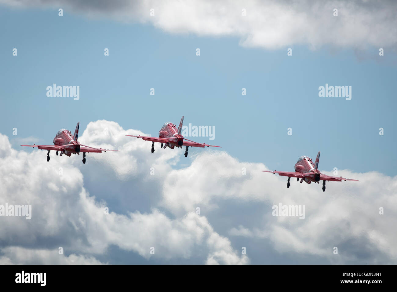 Three RAF Red Arrows Hawk Jets in the sky just after take off Stock ...
