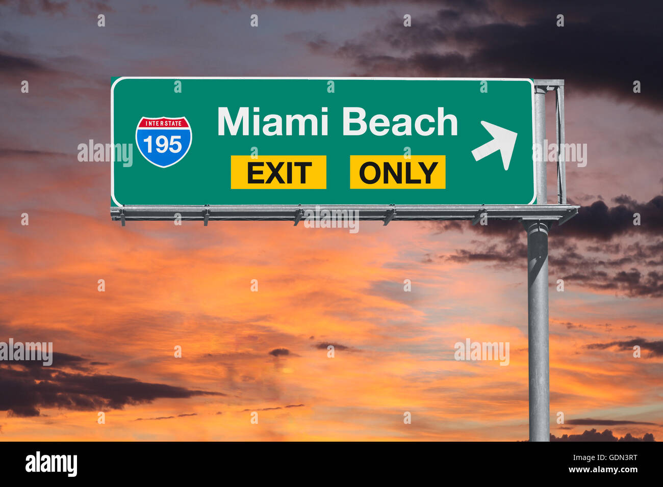 Miami Beach exit only highway sign with sunrise sky Stock Photo - Alamy