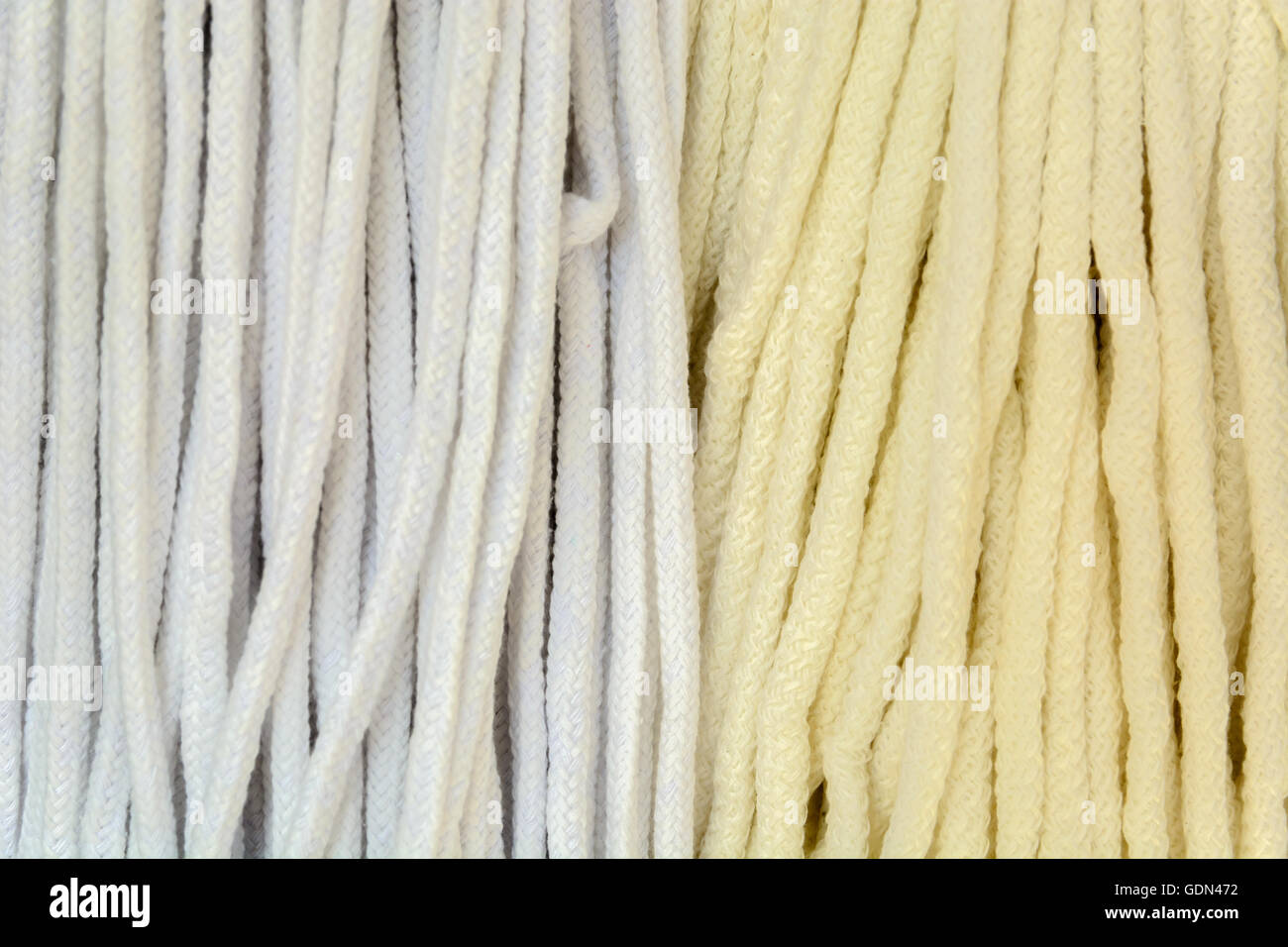 pattern and color in the form of tangled ropes beige Stock Photo - Alamy