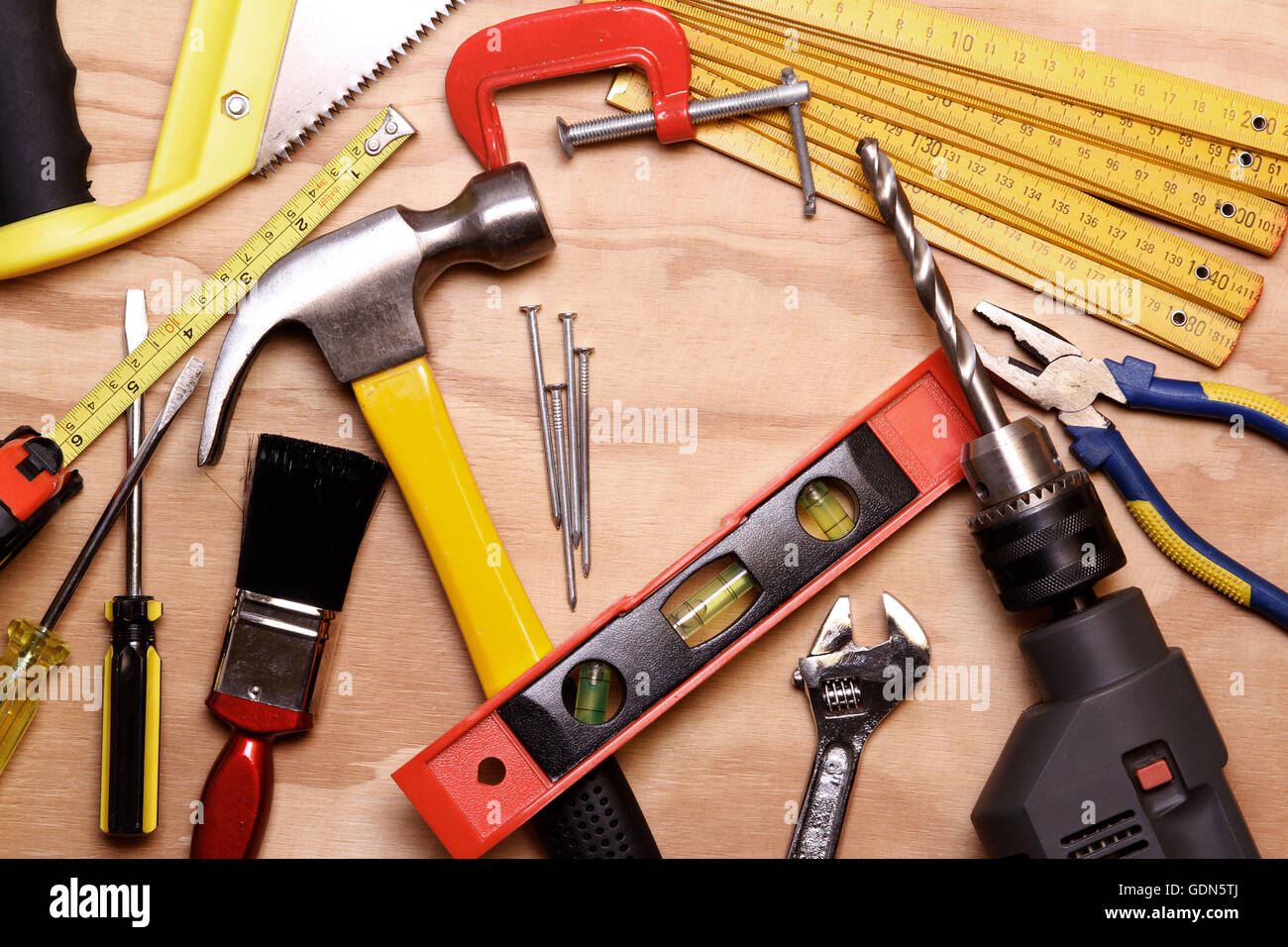 Assorted work tools on wood Stock Photo - Alamy
