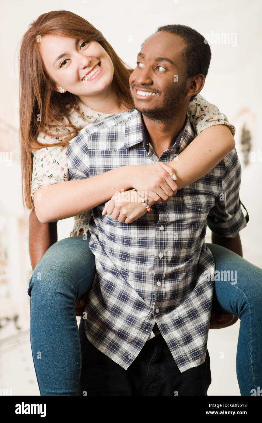 Interracial Couple Wearing Casual Clothes Interacting Having Fun Man