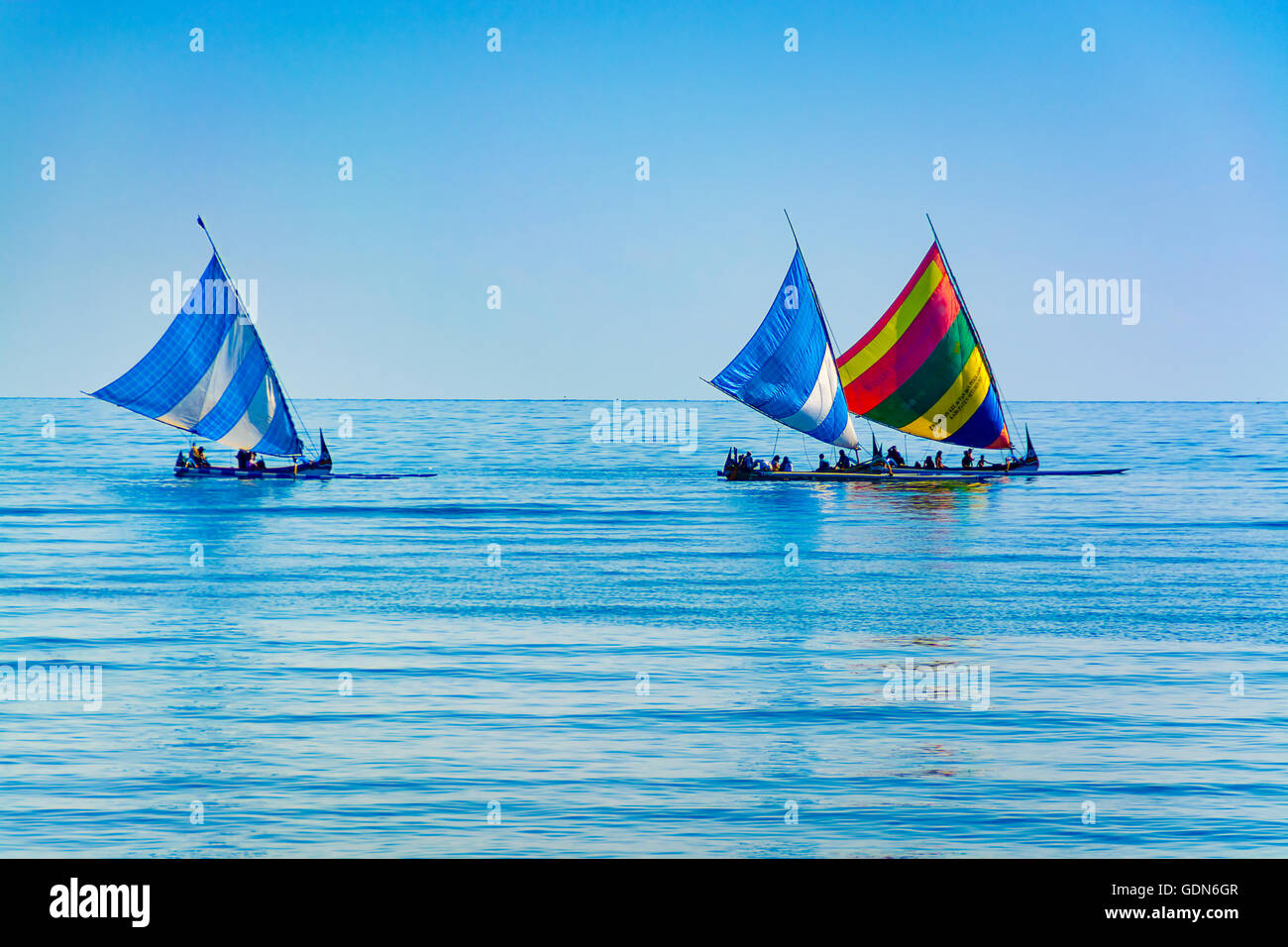 A traditional Indonesia outrigger canoe converted into a sailing boat ...