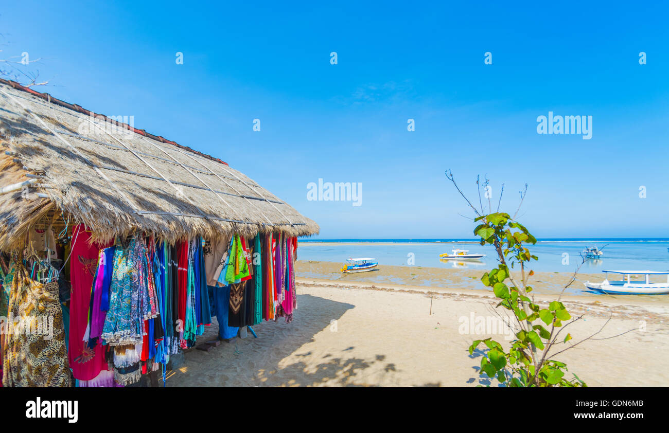 Traditional market selling various products at the beach in Bali with ...
