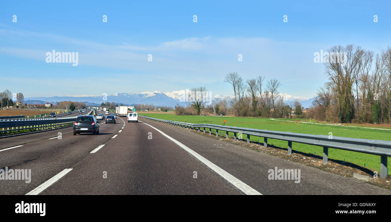 Italian rural landscape with alps, view from motorway Stock Photo - Alamy
